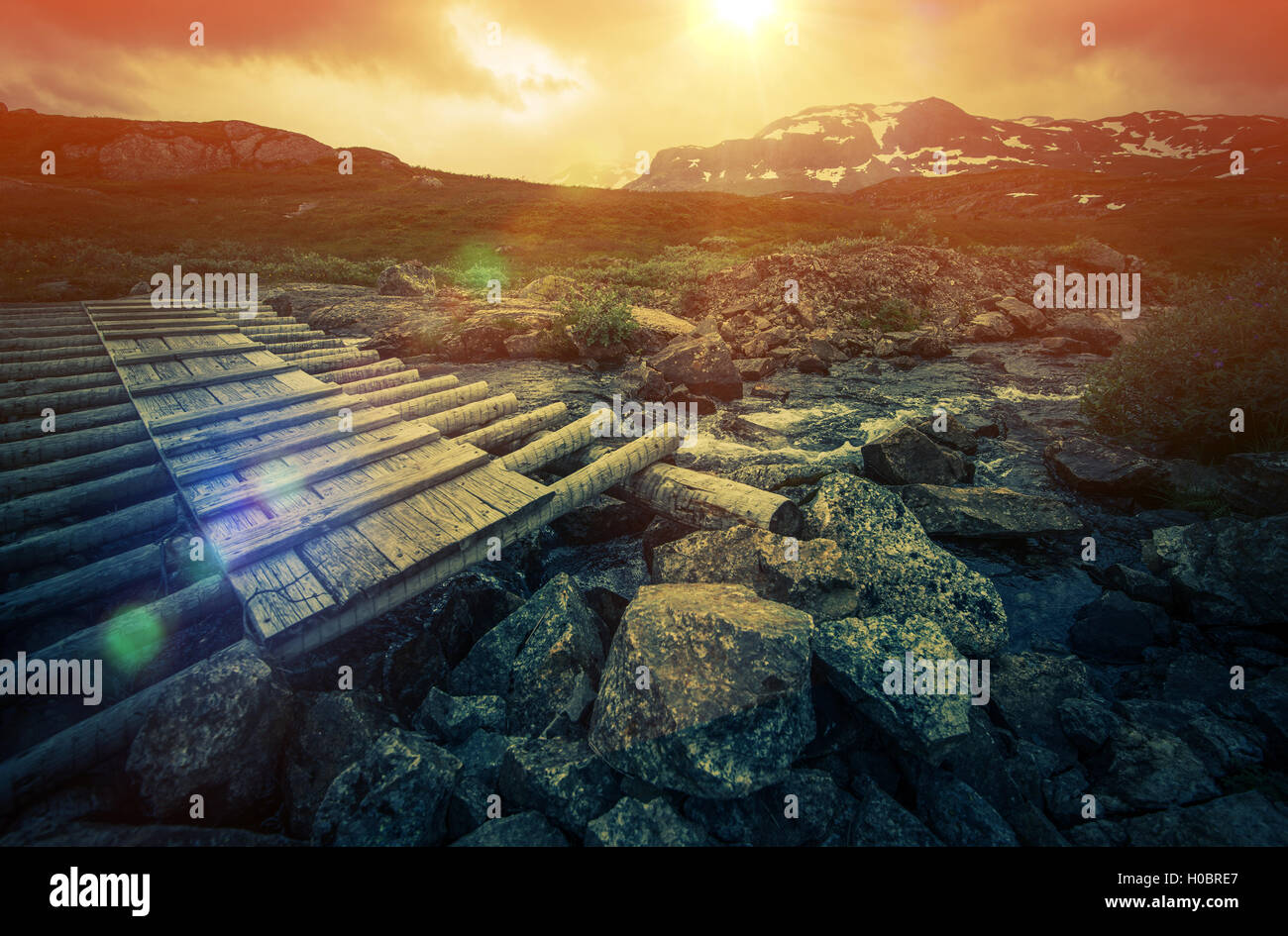 Wooden Trail Bridge and the Norwegian Mountain Landscape. Norway ...