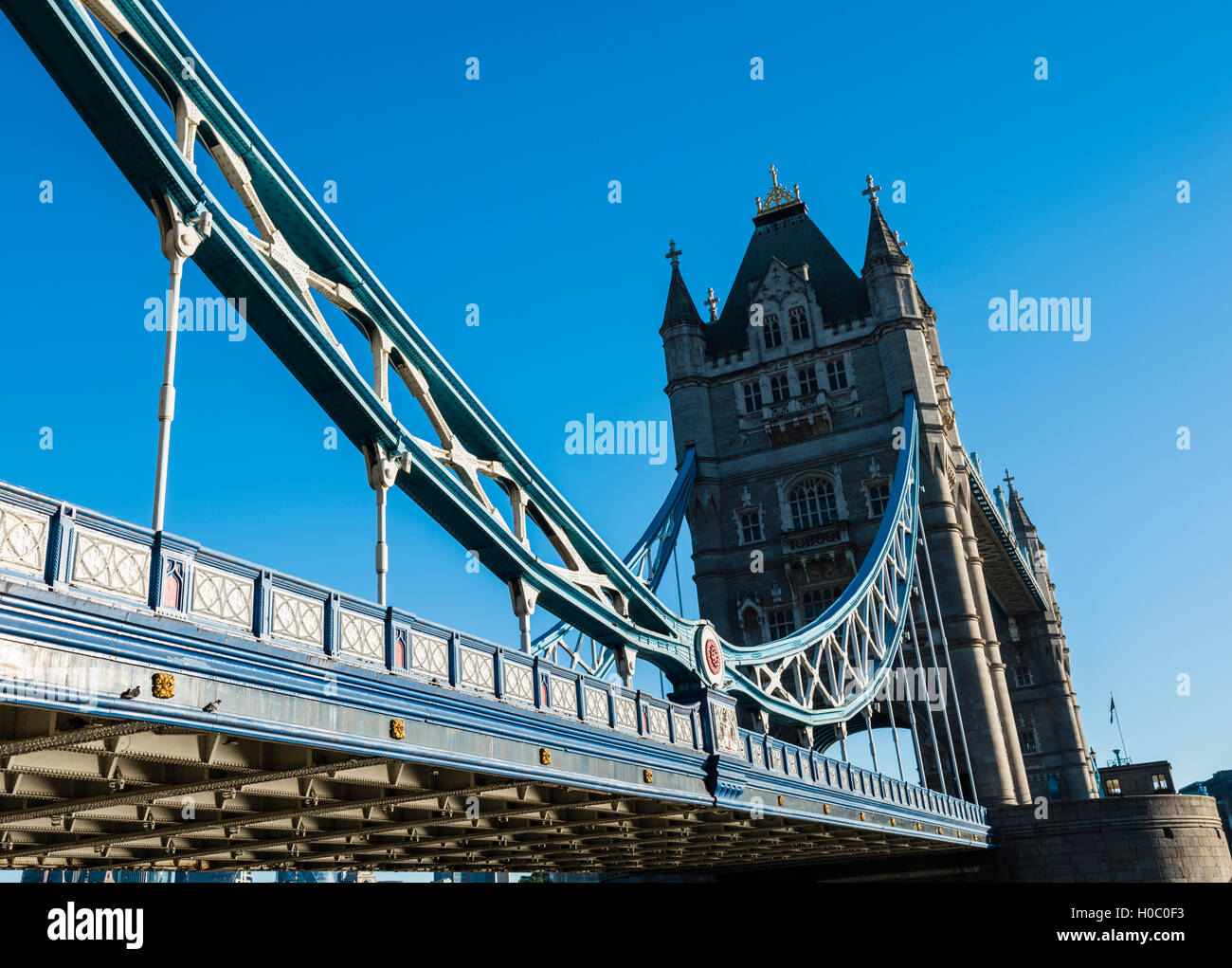 Early morning sunlight captured on the deck of Tower Bridge, London, UK ...
