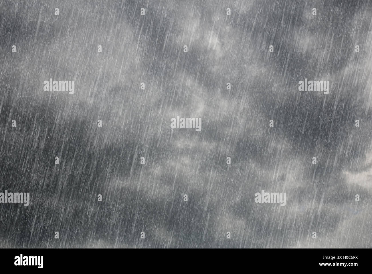 dark storm clouds with falling rain Stock Photo - Alamy