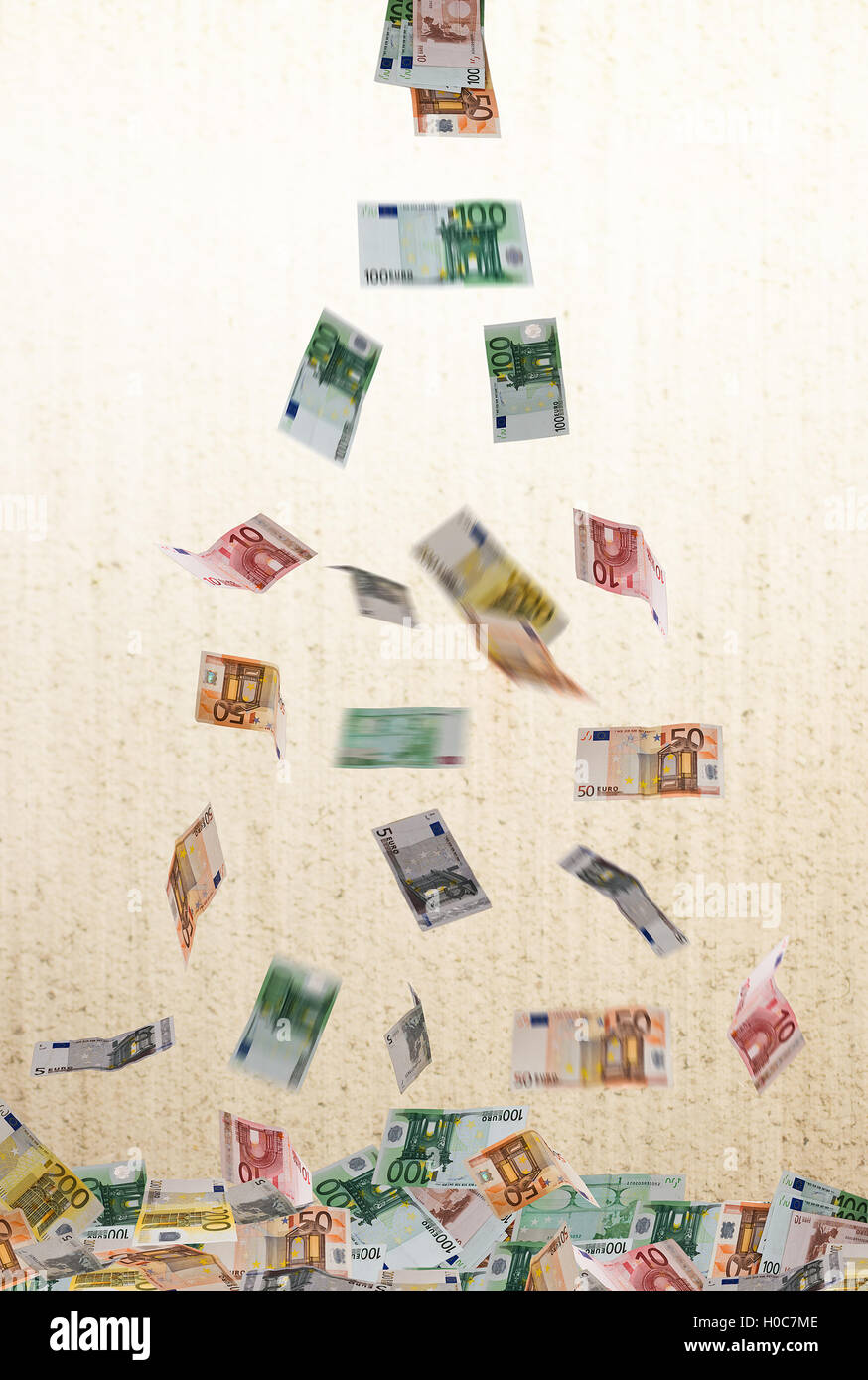 falling of euro currency on the unfocused background Stock Photo - Alamy