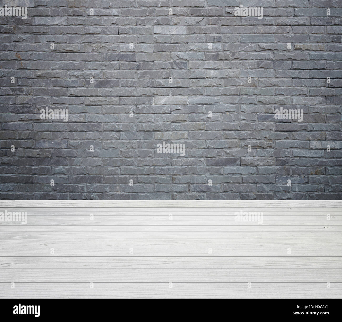 empty room interior with brick stone tiles wall and wood floor ...