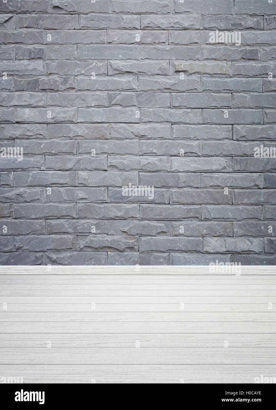 empty room interior with brick stone tiles wall and wood floor ...