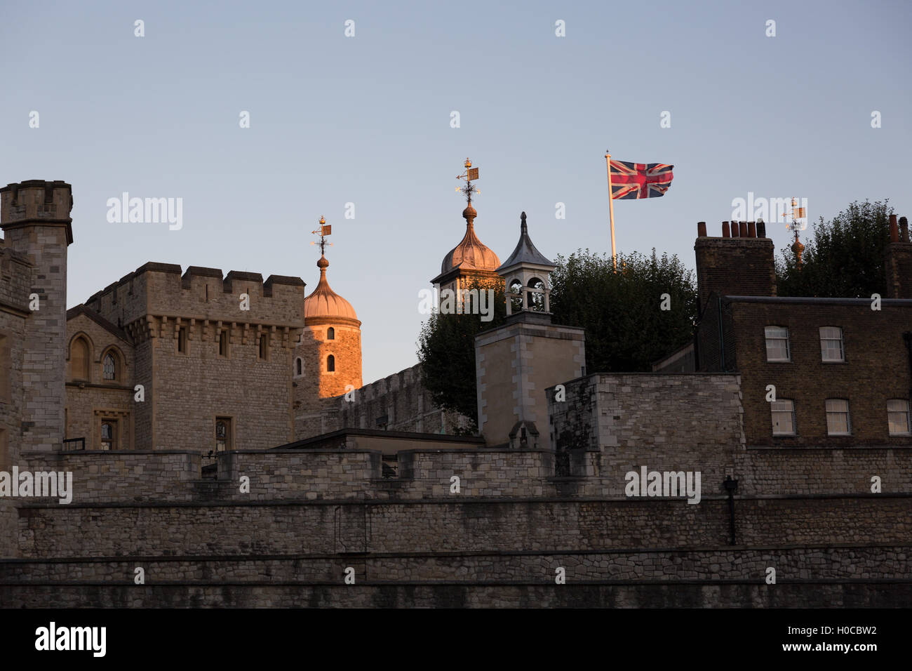 Union Jack flag flying over The Tower of London Uk Stock Photo - Alamy