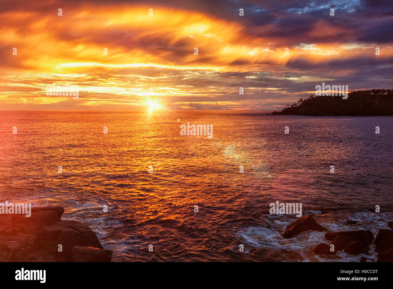 Ocean sunset with dramatic sky Stock Photo - Alamy