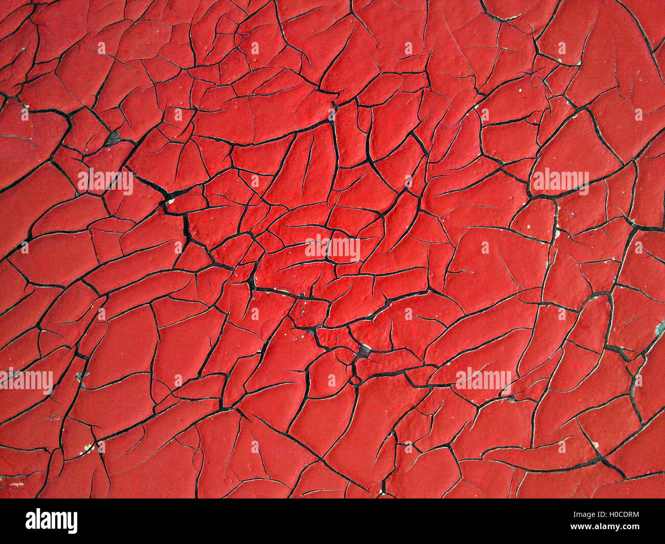 Peeling red paint Stock Photo - Alamy