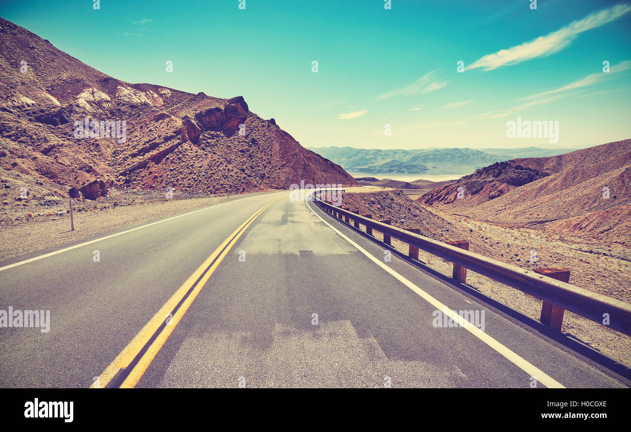 Vintage toned desert road in Death Valley, travel concept, USA Stock ...
