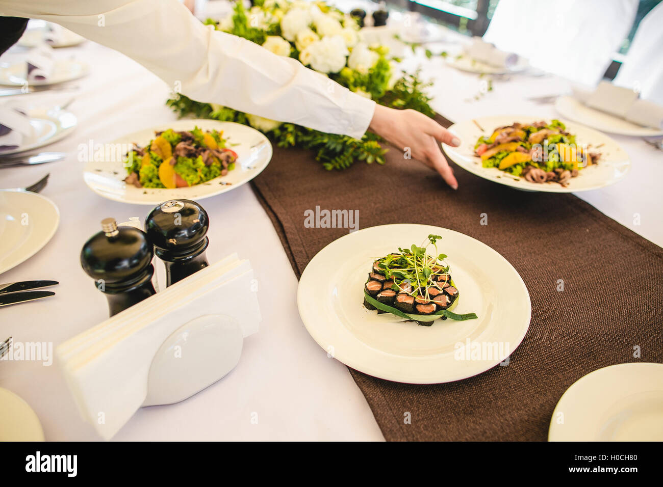Beautifully decorated catering banquet table with different food snacks ...