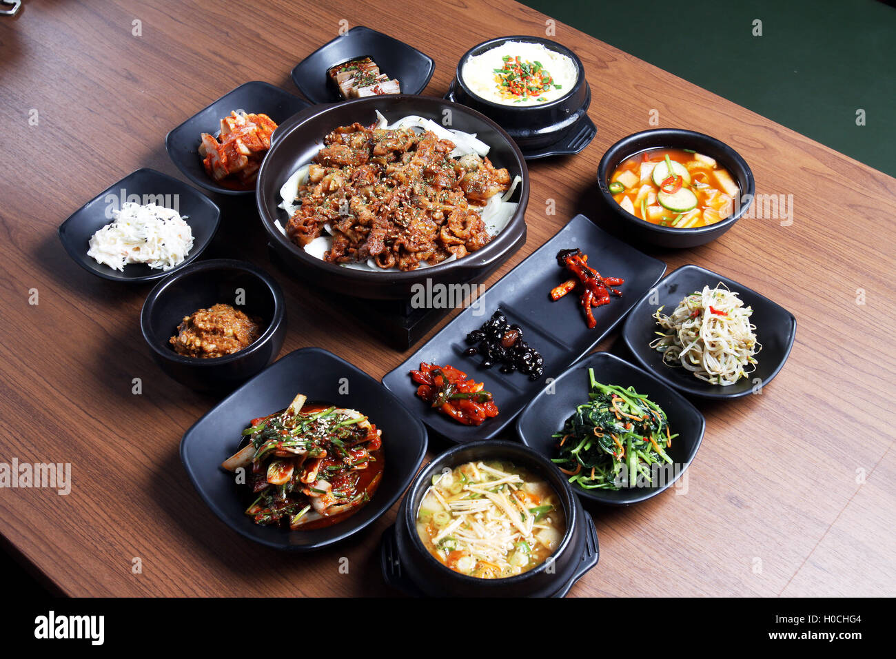 A traditional korean tray meal on wooden table Stock Photo - Alamy