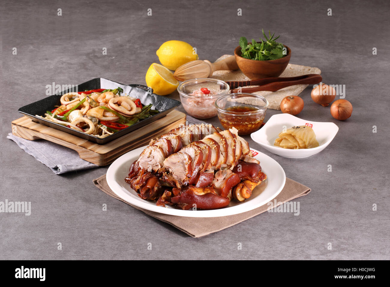 Seasoned pork feet of meeting and host a variety of seafood and a ...