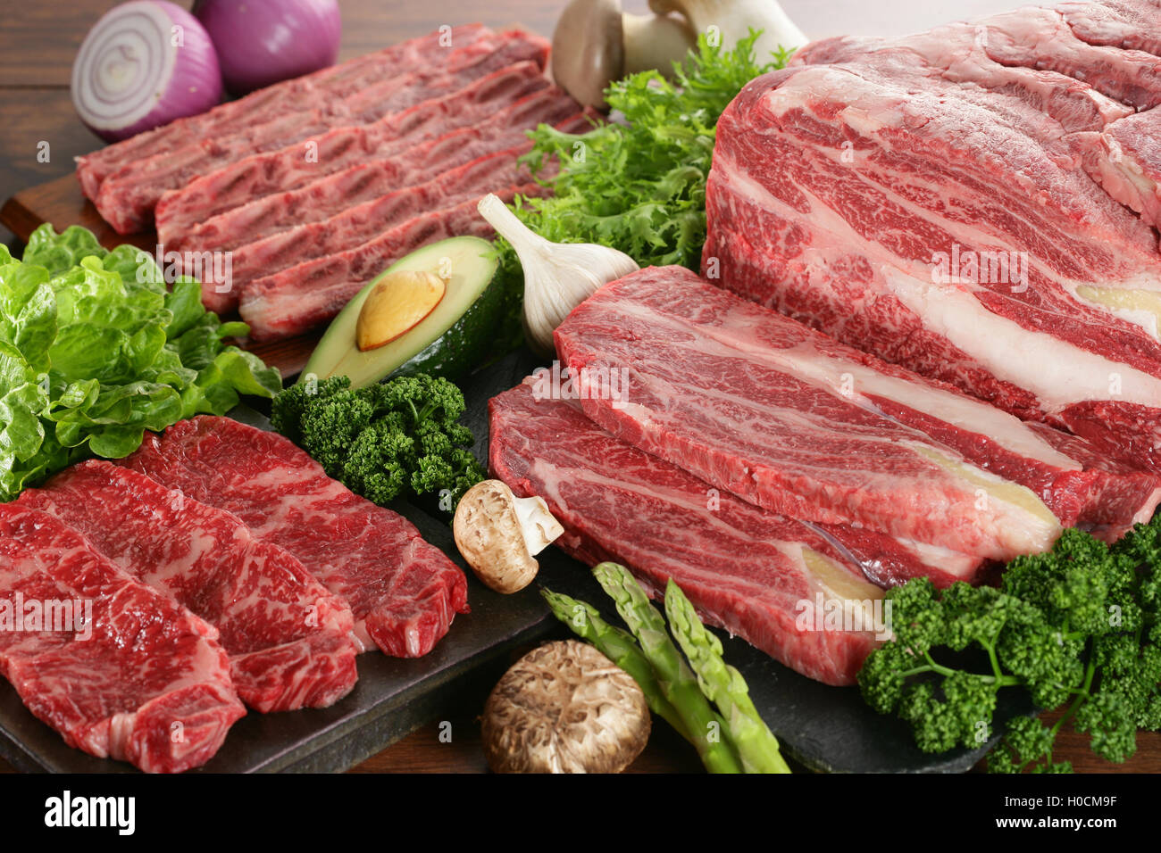 Fresh red beef with mushroom, avocado, cabbage, garlic and onion Stock ...