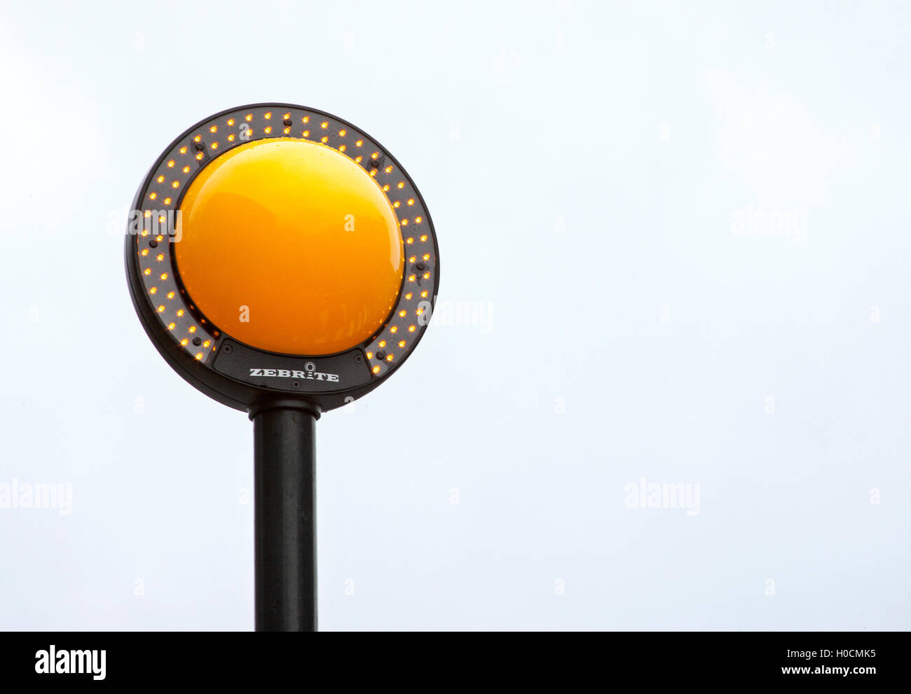 Belisha with an outer ring of flashing amber led lights hi-res stock ...