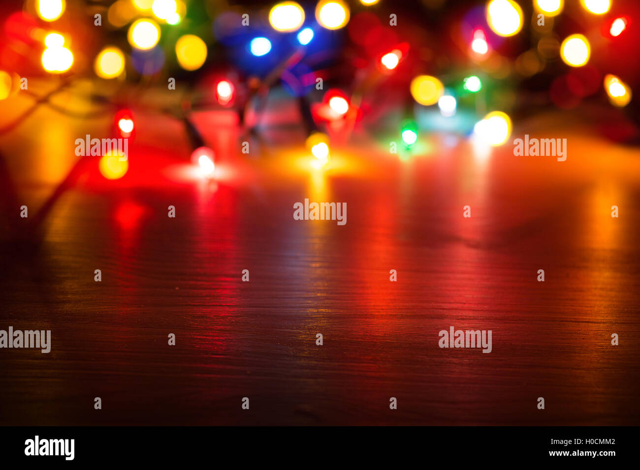 Colorful lights on red background Stock Photo - Alamy
