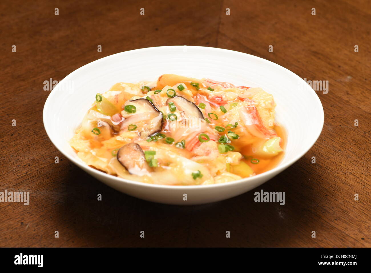 Japanese Kani soup with mushroom and meat on the table Stock Photo - Alamy