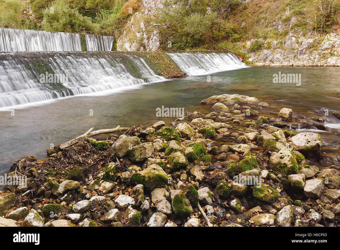 Gradac river with the waterfalls in background,. Long exposure of white ...