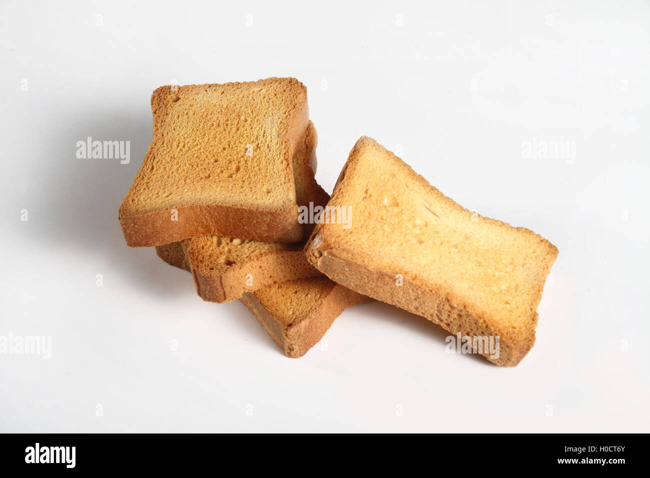 four slices toast viewed from above on a white background Stock Photo ...