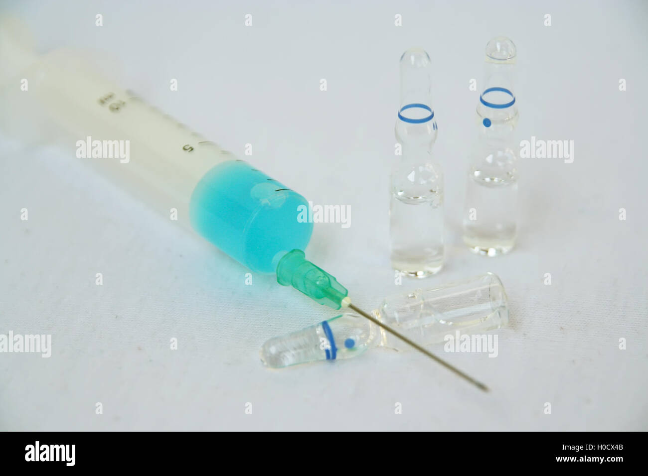 Poison bottle and syringe hi-res stock photography and images - Alamy