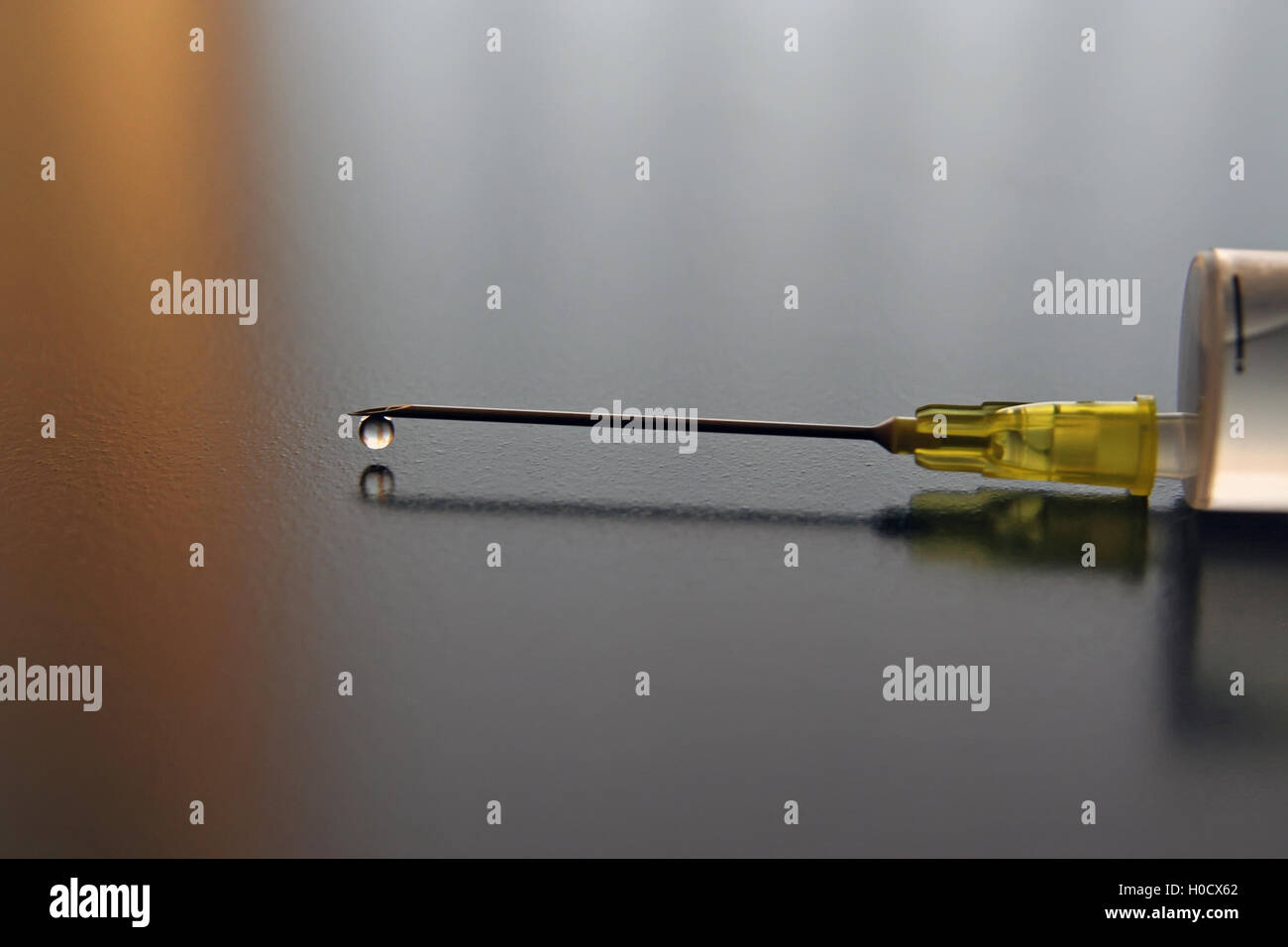 Medical syringe with the cure. Medicine and cure. Cure in the syringe ...