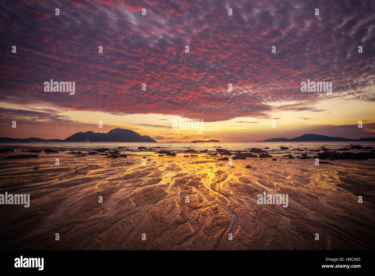 amazing Thai sunset at the beach Stock Photo - Alamy