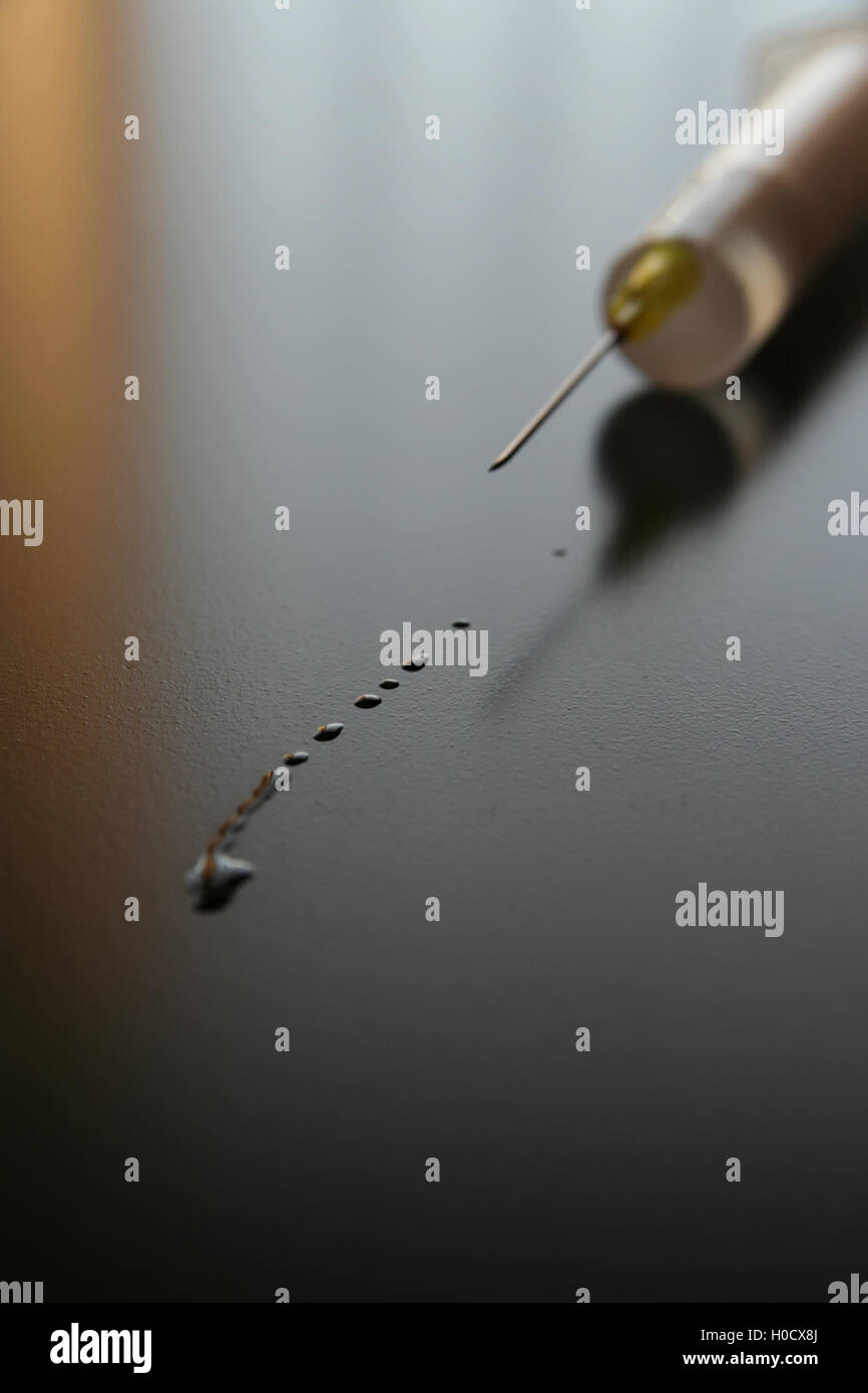 Medical syringe with the cure. Medicine and cure. Cure in the syringe ...