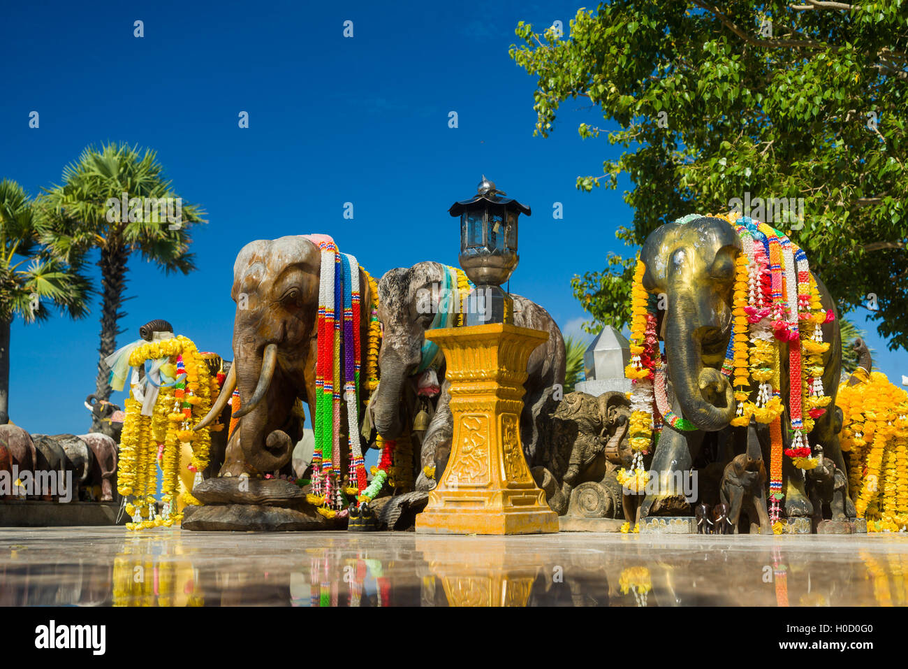 Elephants at the Phuket lighthouse temple Prom THep Stock Photo - Alamy