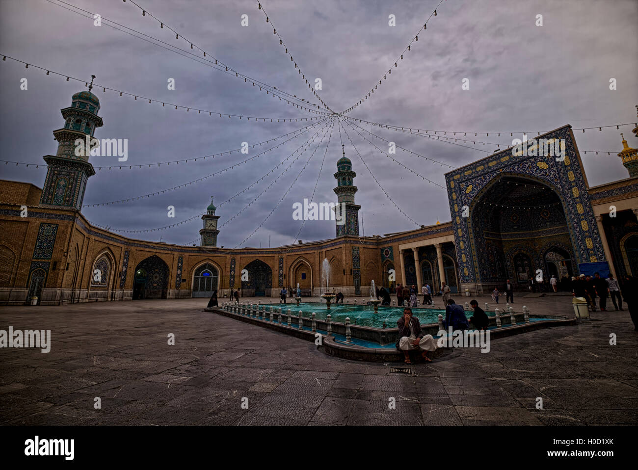 Qum mosque ablution at dusk Stock Photo - Alamy