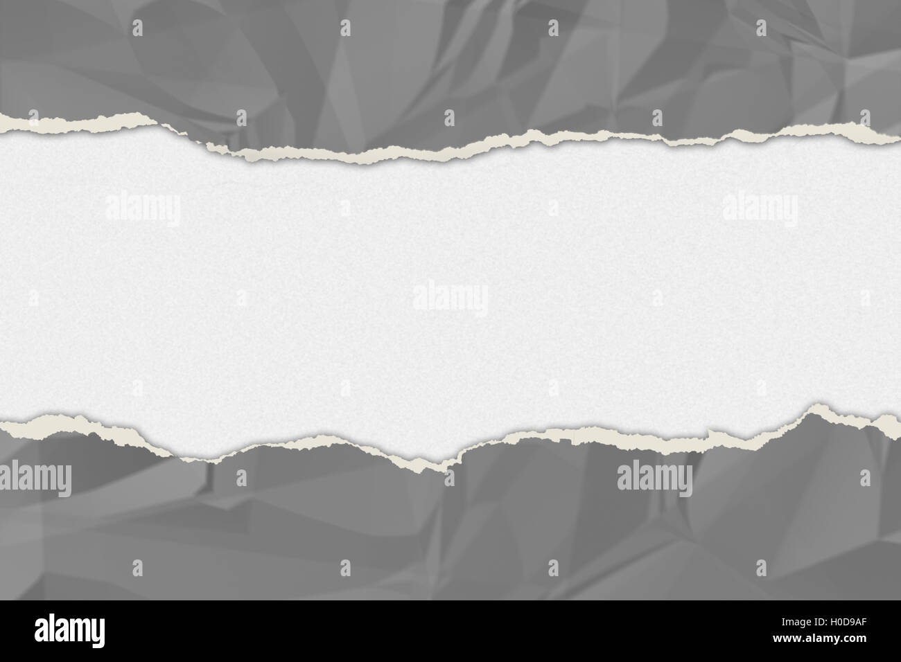 grey wrinkled paper ripped on the white board. vintage style for your ...