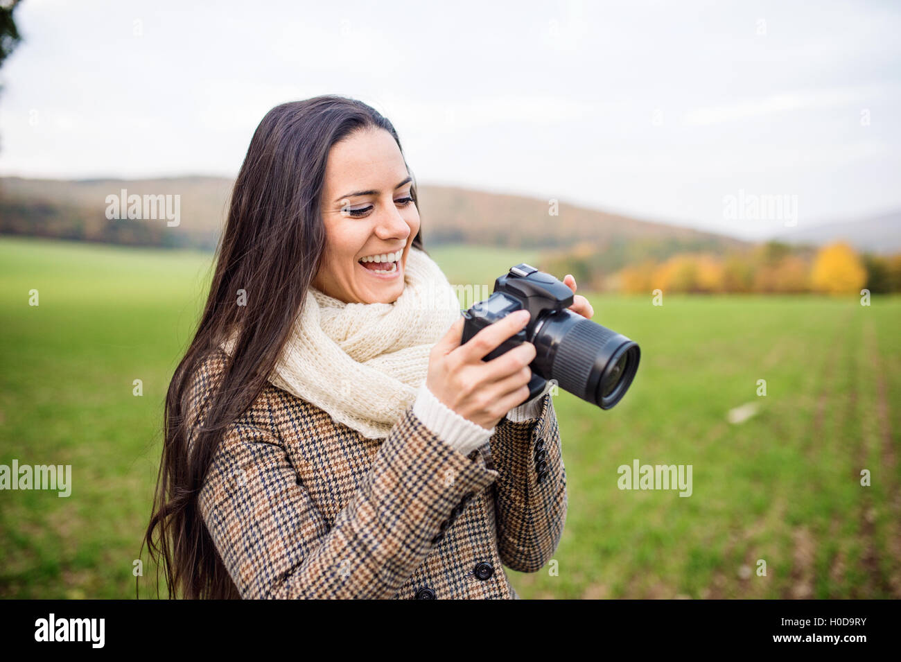 Woman taking pictures tree hi-res stock photography and images - Alamy