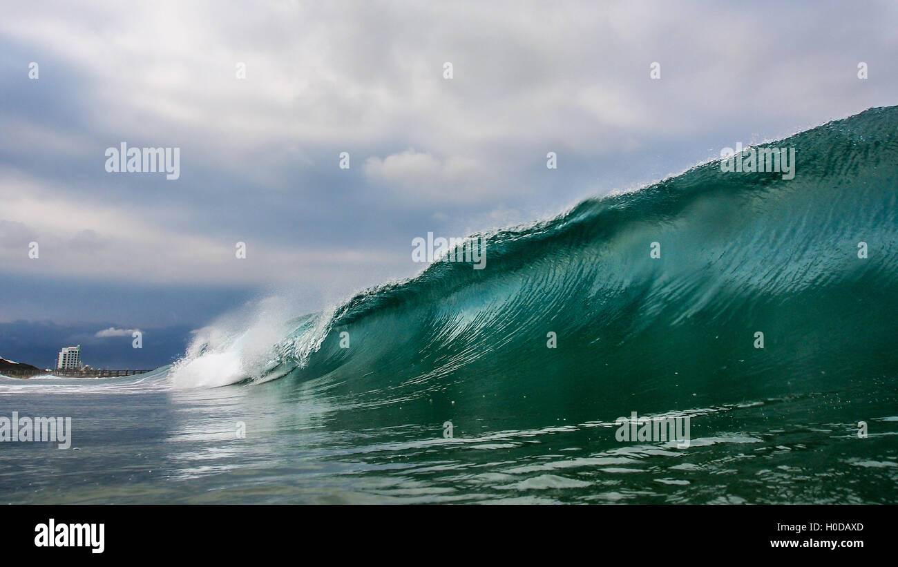 A wave breaks on the shore in Durban, South Africa Stock Photo - Alamy