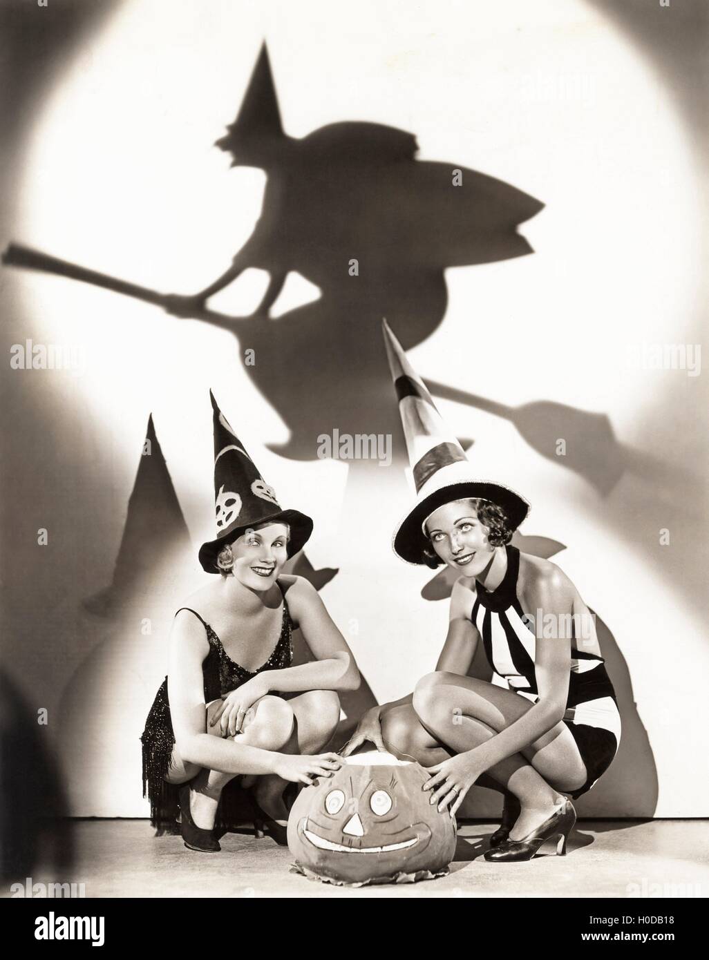 Two women celebrate a bewitching Halloween Stock Photo - Alamy