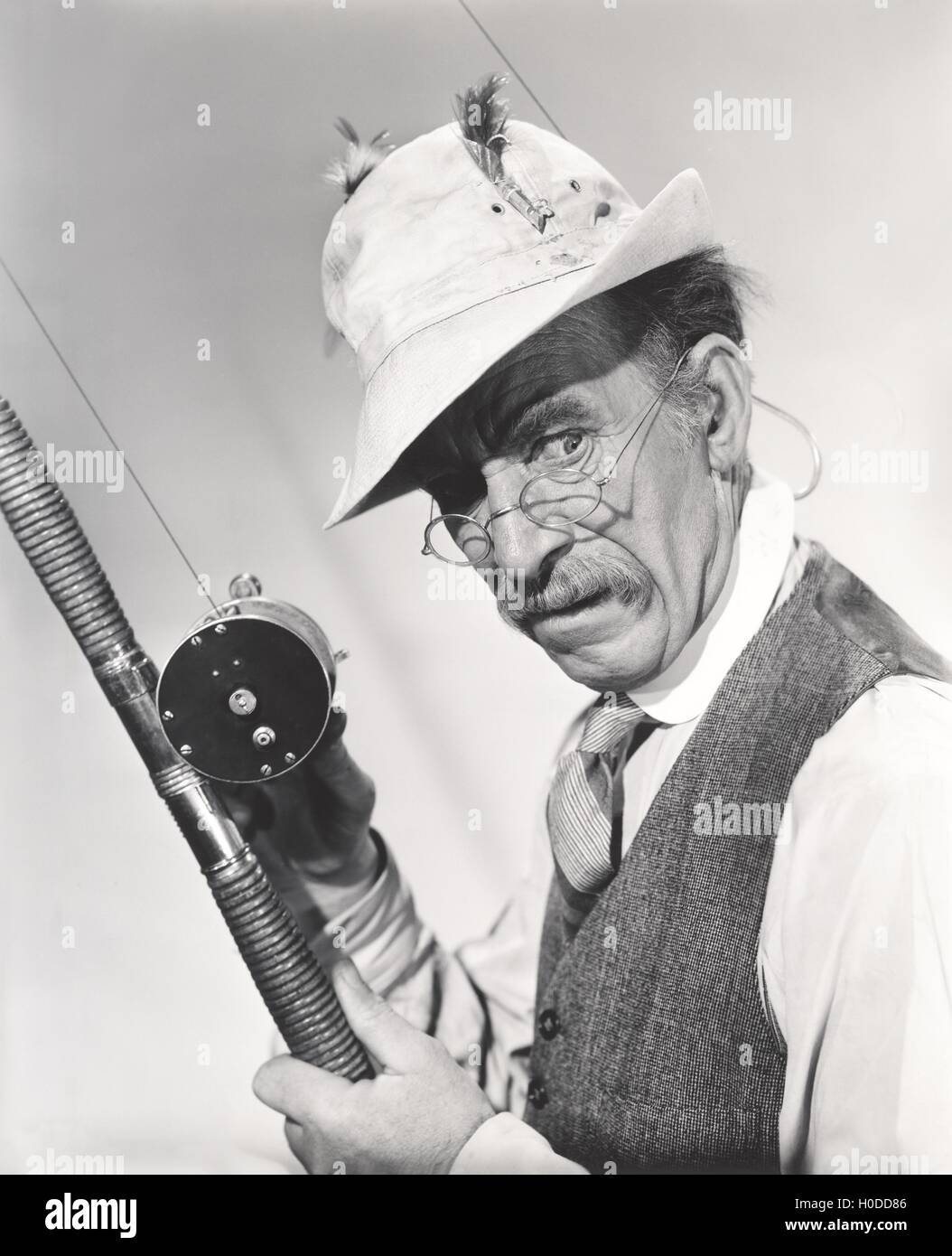 Reeling 'em in Stock Photo - Alamy