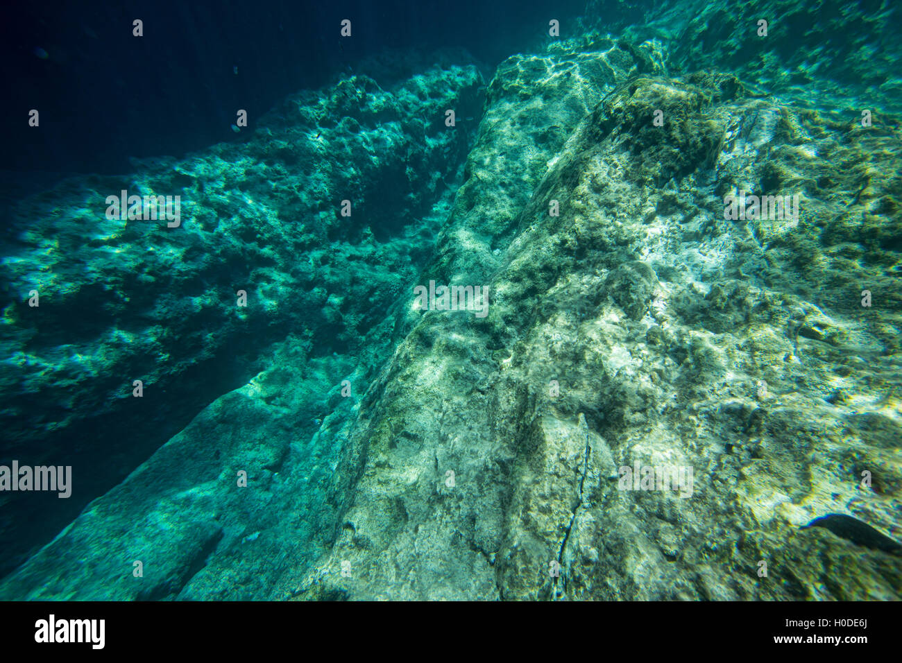 Rocks under water Stock Photo - Alamy