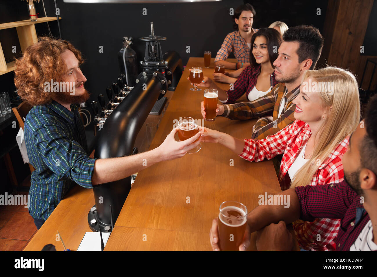 Barman talking pub service hi-res stock photography and images - Alamy