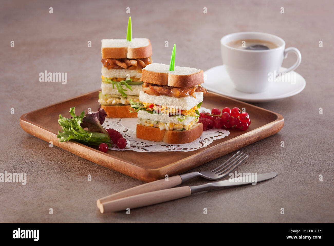 Vegetable toast on wooden tray with coffee and lettuce Stock Photo - Alamy