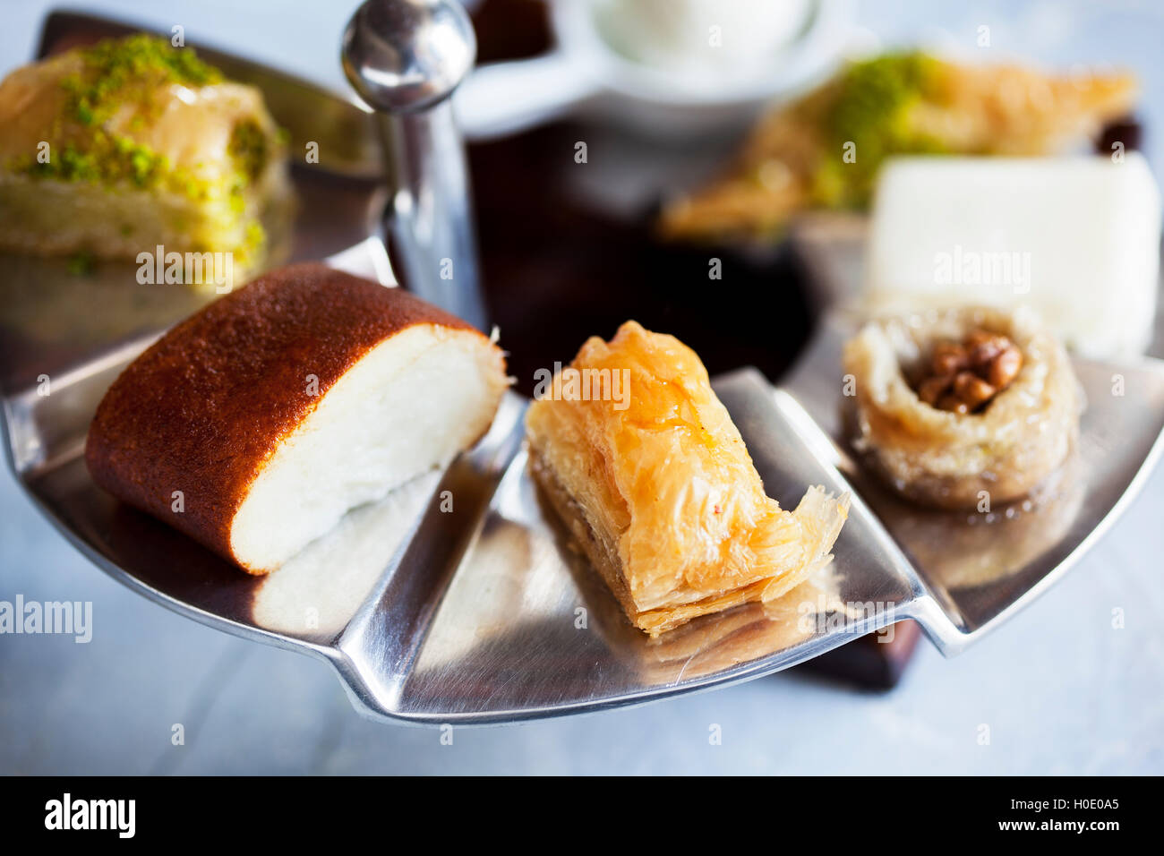 Turkish dessert platter with toast on steel tray in restaurant Stock ...