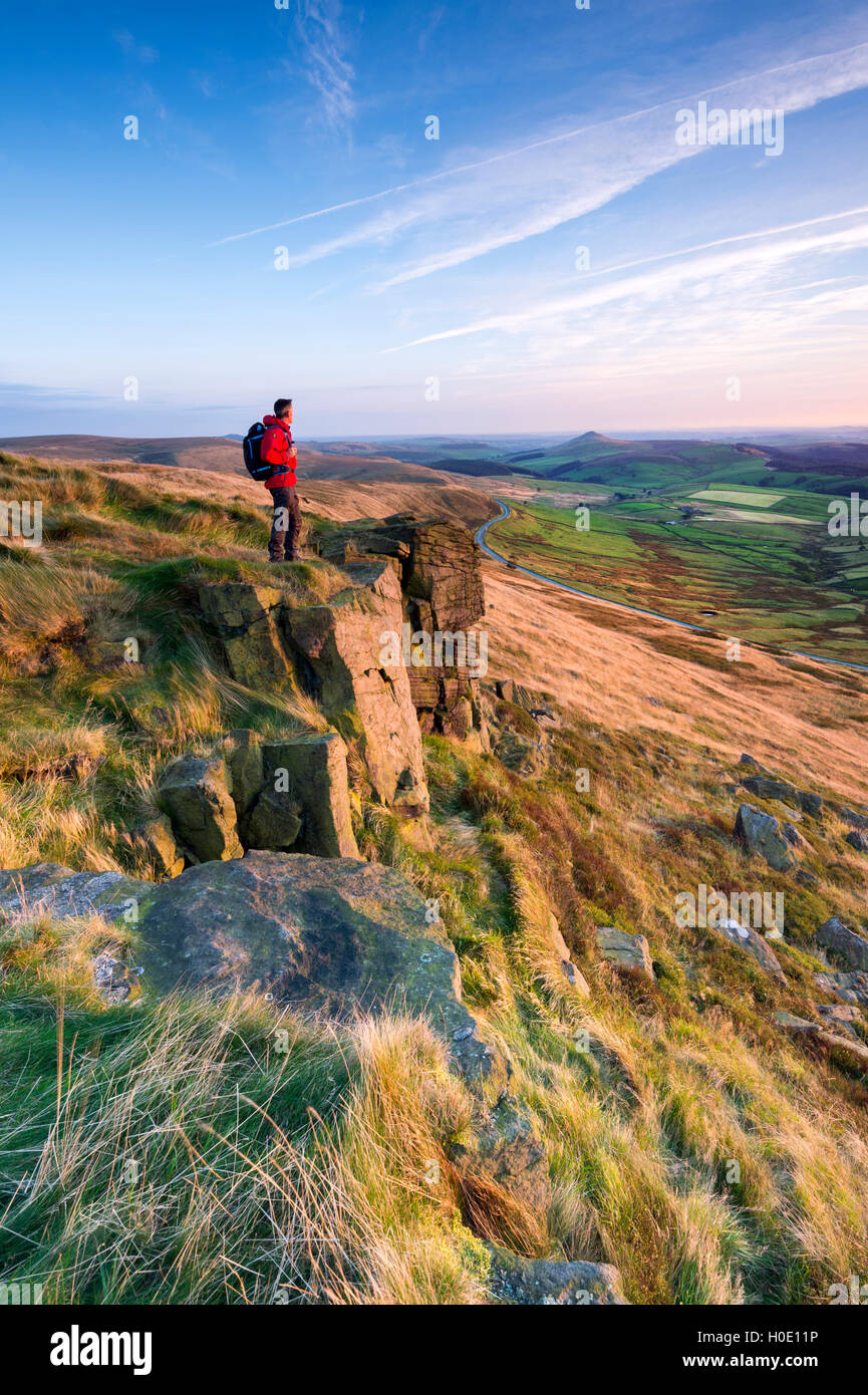 A walker stood on Shining Tor looking towards Shutlinsloe, Peak ...