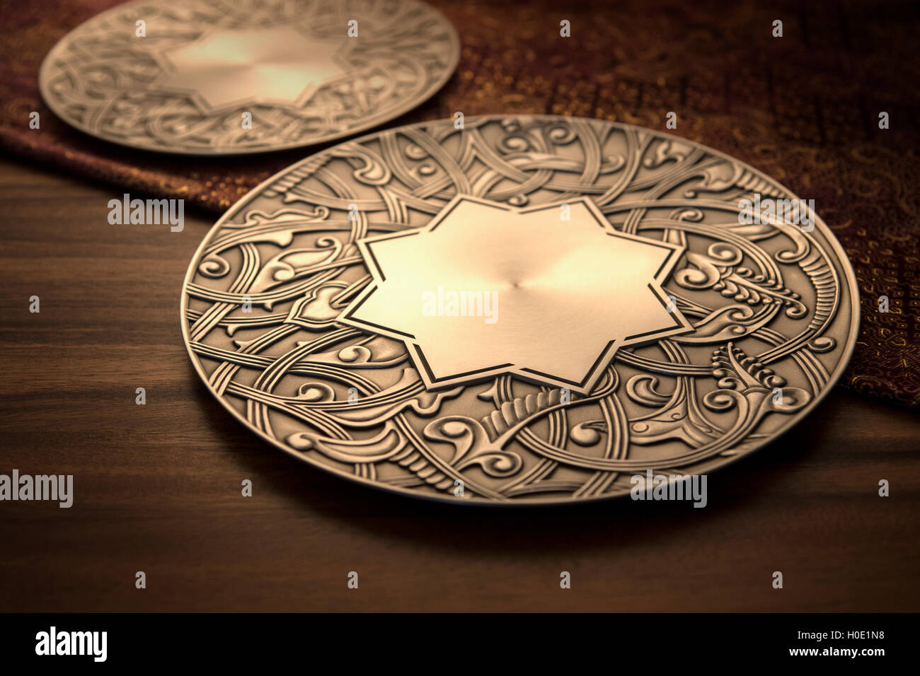 Indonesian copper plate on wooden table in black background Stock Photo ...