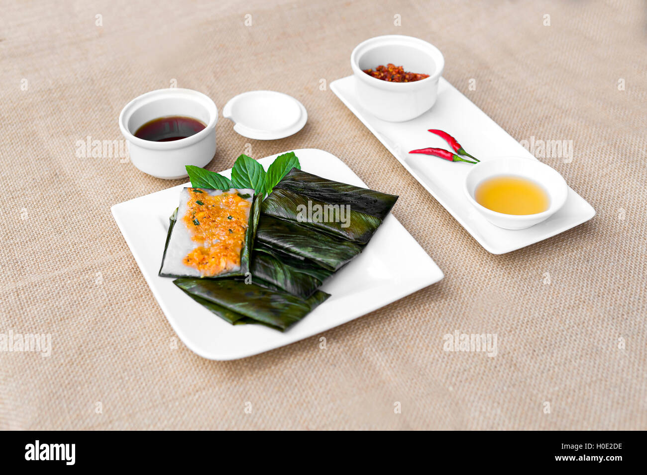 Vietnamese steamed rice pancake with shrimp or banh nam Hue on white ...