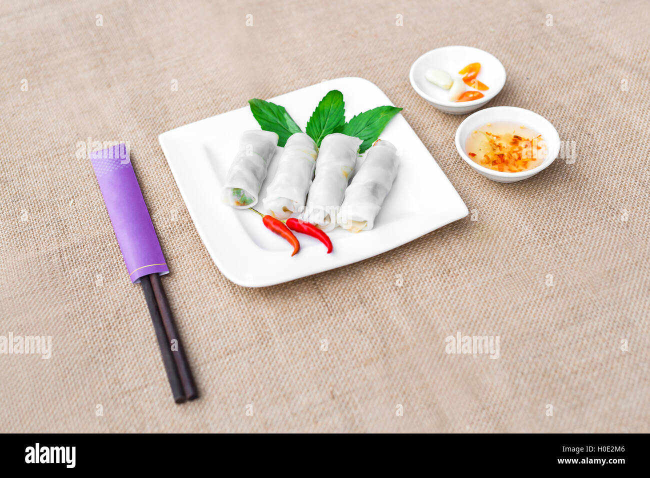 Vietnamese steamed thin rice pancake for fried pork rolls or banh uot ...