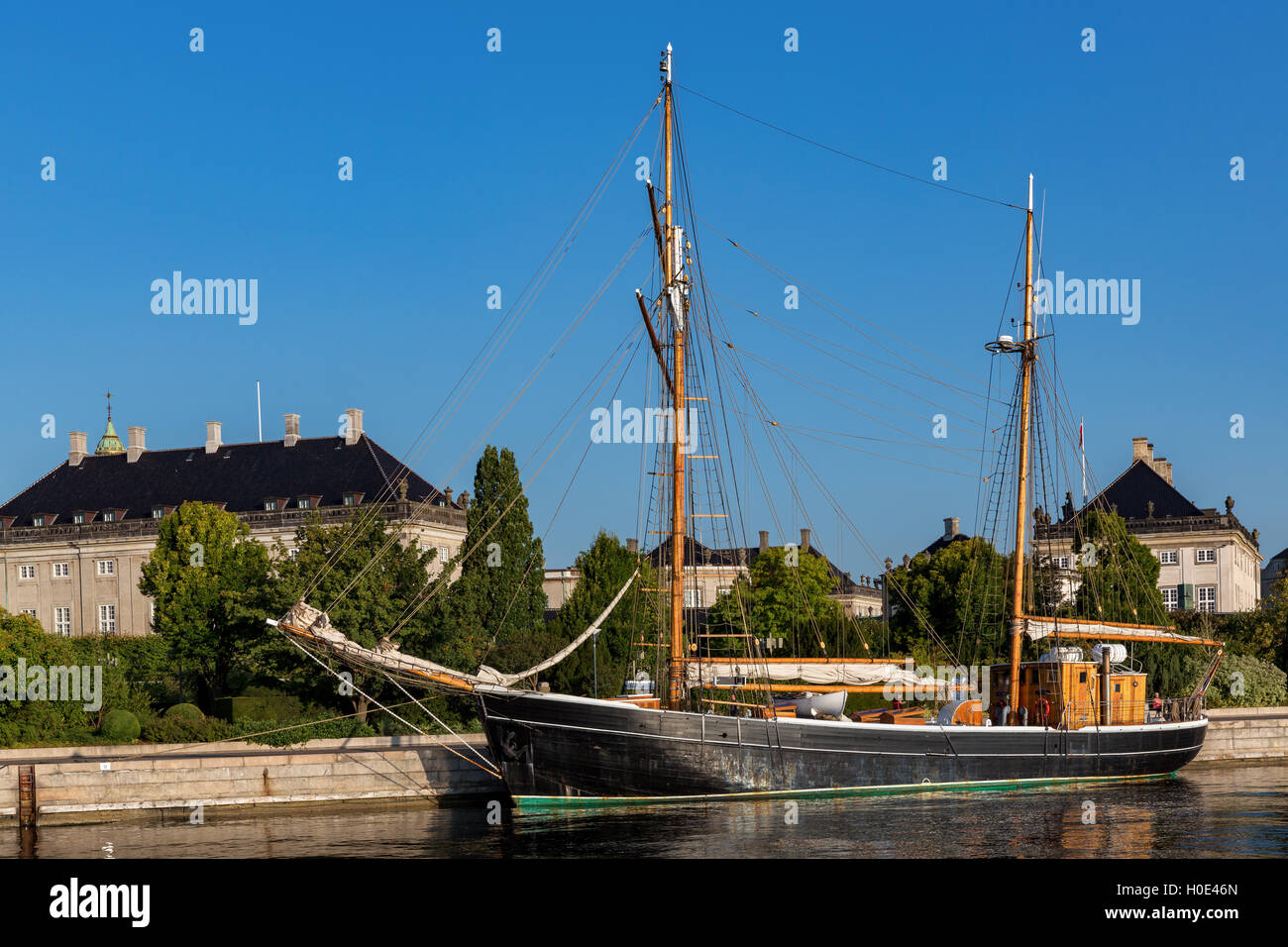 Old wooden sail ship at dock near Amalienborg Palace, Copenhagen ...