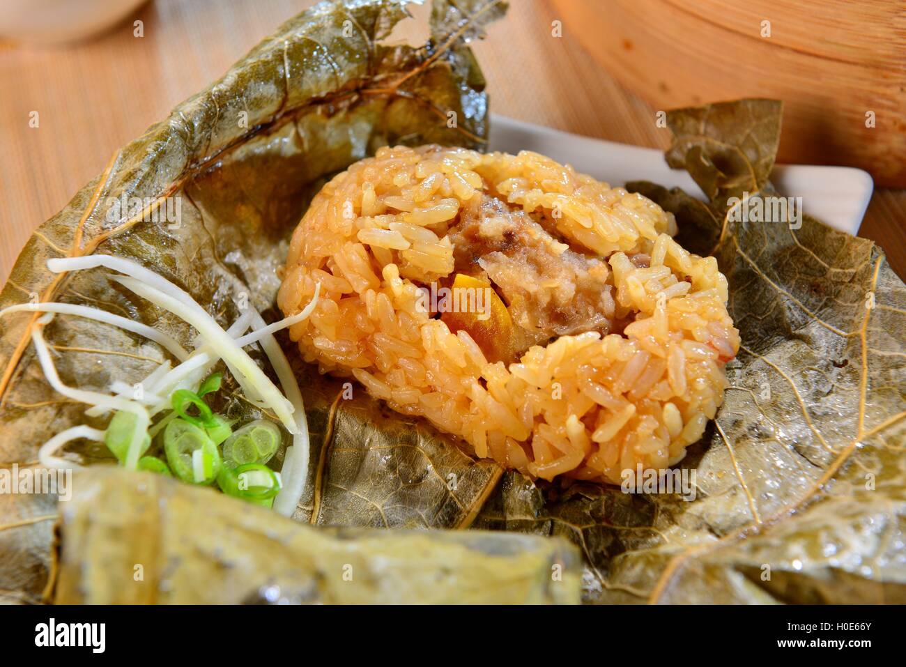 Lotus leaf wrapped rice hi-res stock photography and images - Alamy
