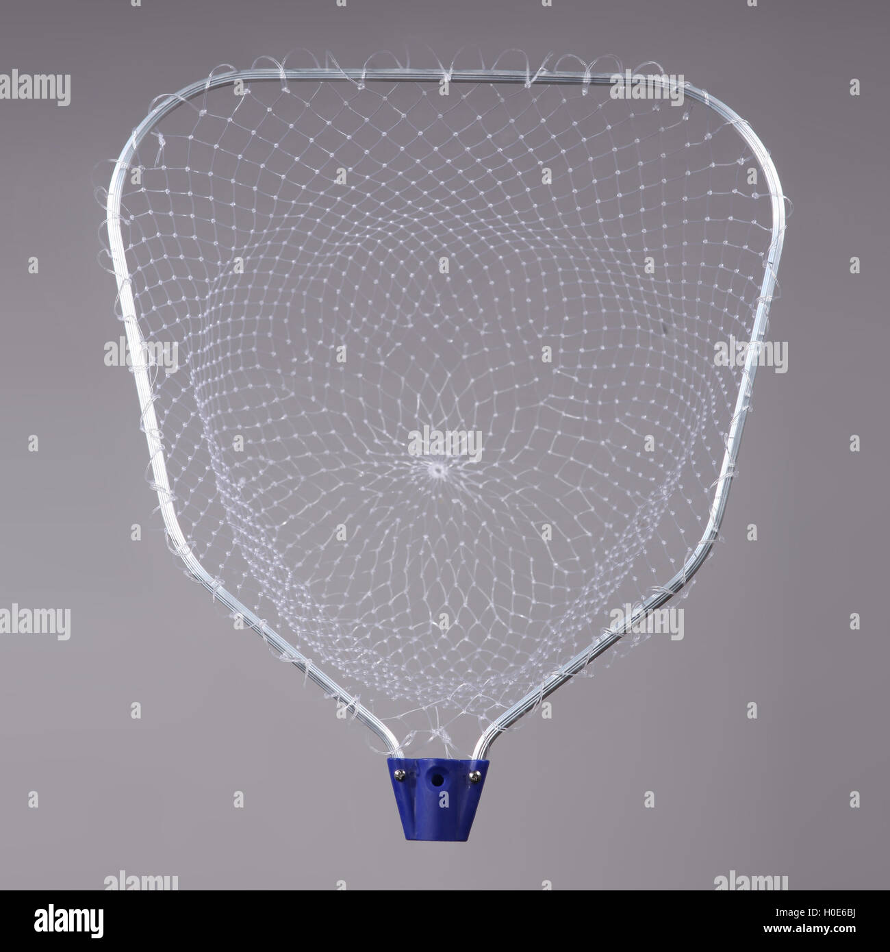 Harvest gear of nylon grass nets for fishing on grey background Stock ...