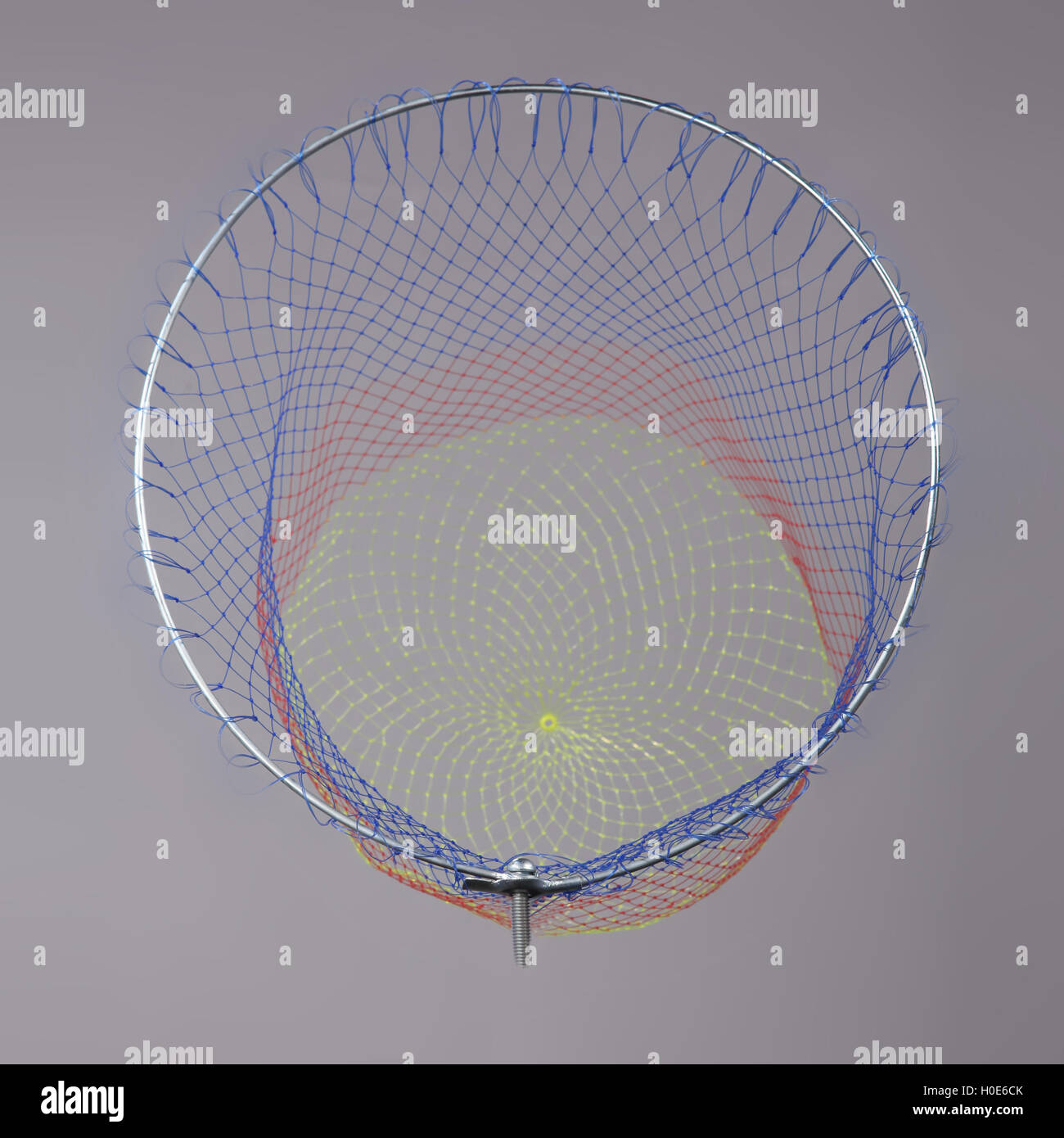Harvest gear of nylon grass nets for fishing on grey background Stock ...