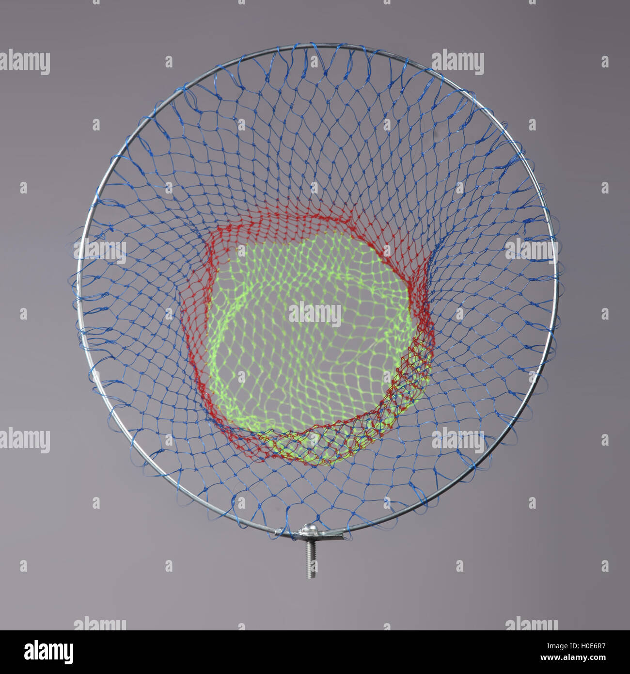 Harvest gear of nylon grass nets for fishing on grey background Stock ...