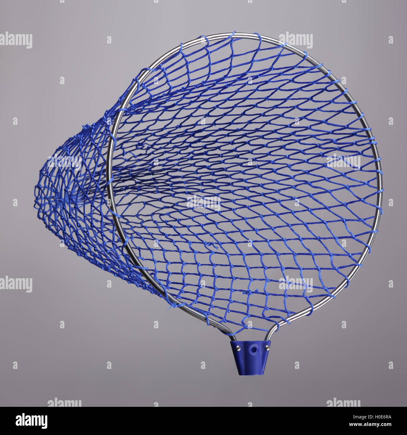 Harvest gear of nylon grass nets for fishing on grey background Stock ...