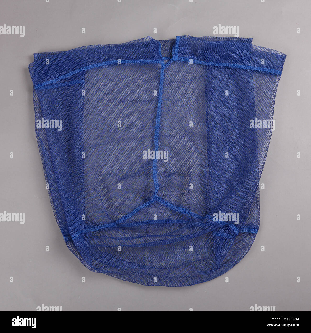 Harvest gear of nylon grass nets for fishing on grey background Stock ...