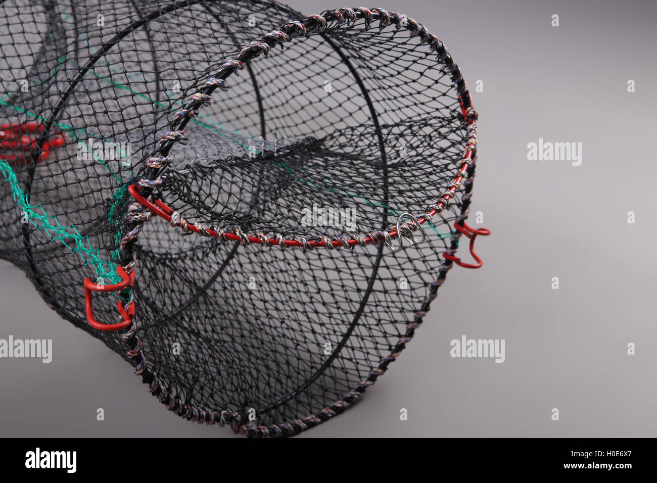 Harvest gear of Eel cylindrical cage on grey background Stock Photo - Alamy