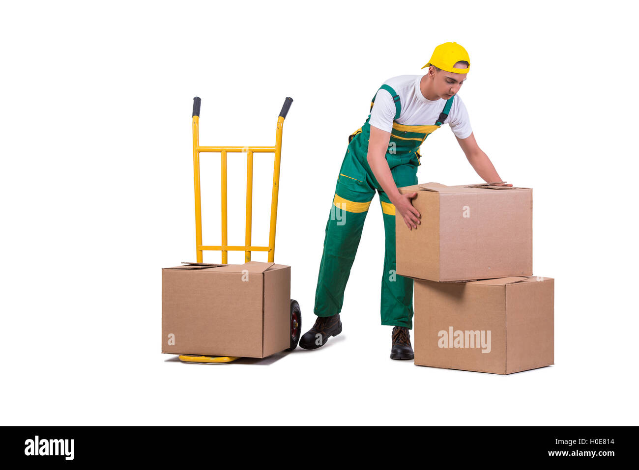 Young man moving boxes with cart isolated on white Stock Photo - Alamy
