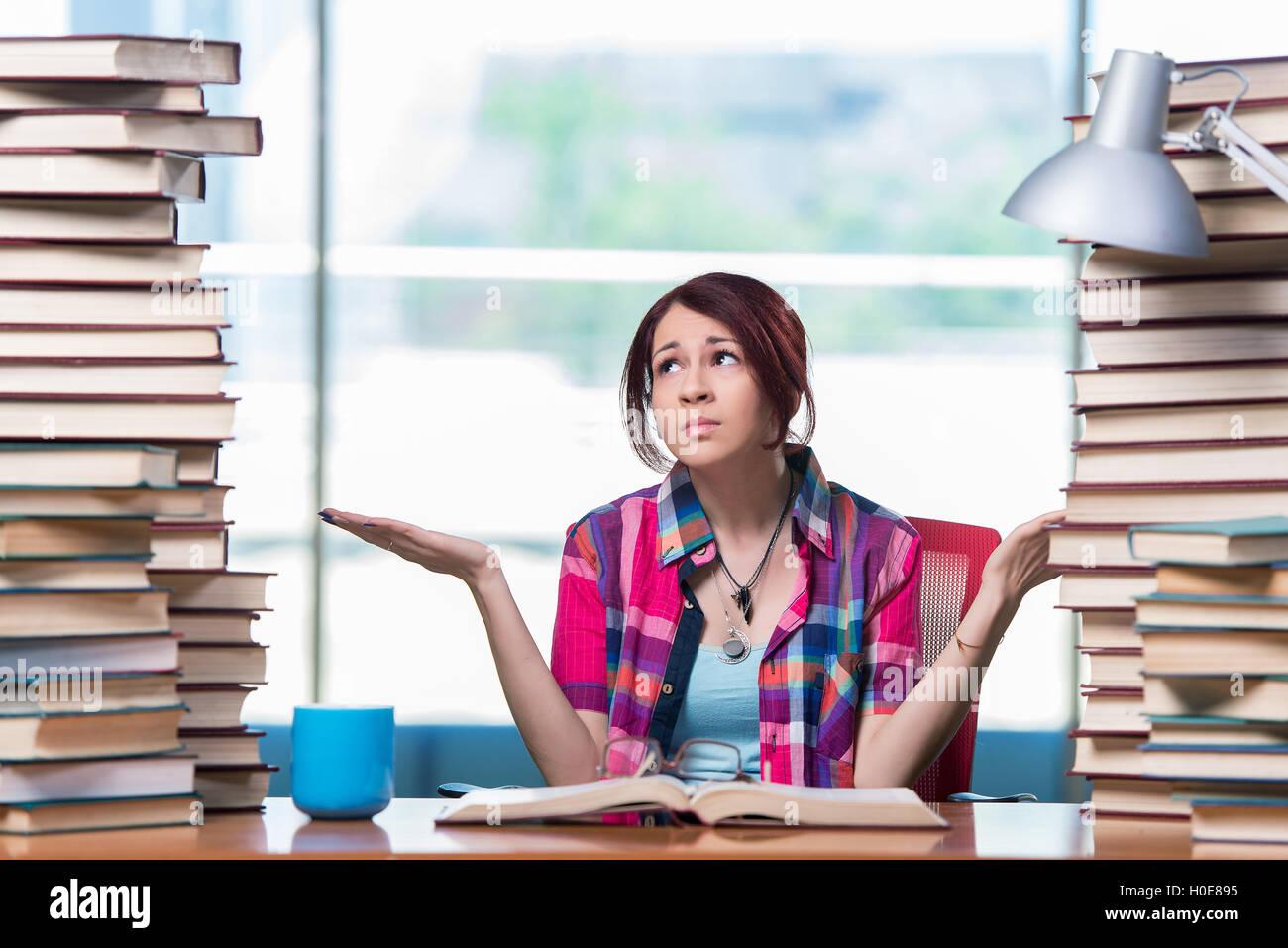 Young female student preparing for exams Stock Photo - Alamy