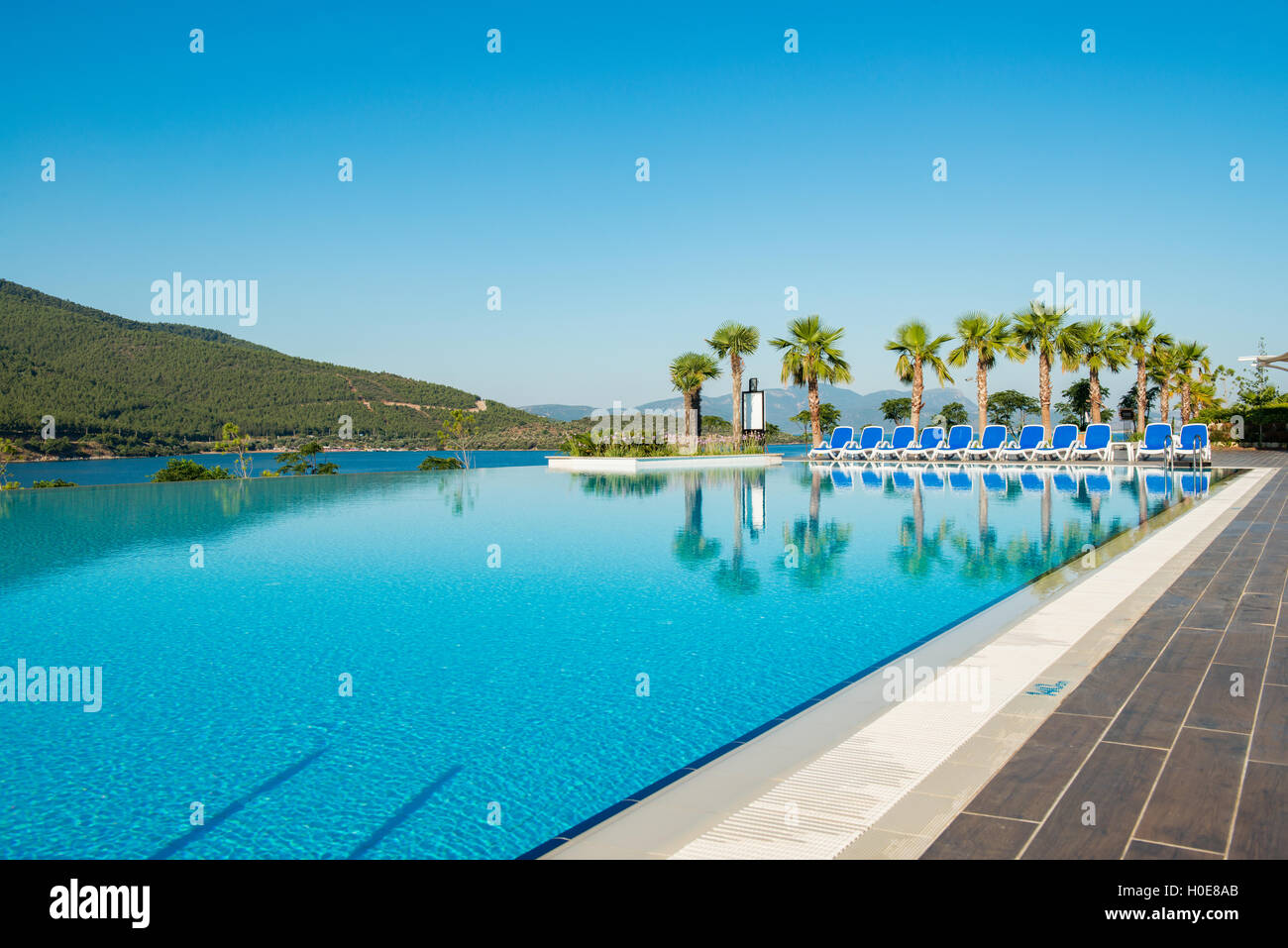 Nice swimming pool outdoors on bright summer day Stock Photo - Alamy