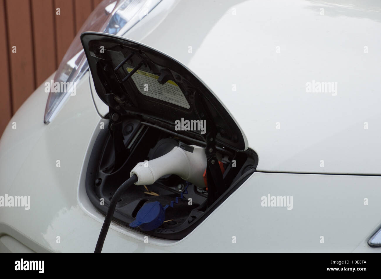 Ecologically Friendly Electric Car Getting Charged Stock Photo - Alamy